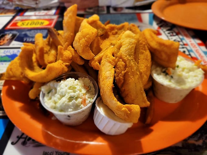 Golden pollock piled high like a fisherman's dream catch. This plate doesn't just feed your hunger—it tells stories of the Great Lakes.