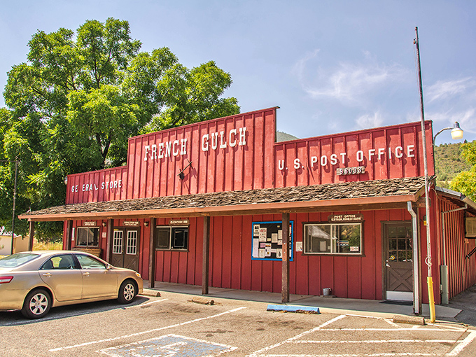 The bright red French Gulch Post Office doubles as the town's social hub. Mail delivery here isn't just a service – it's a daily community event.