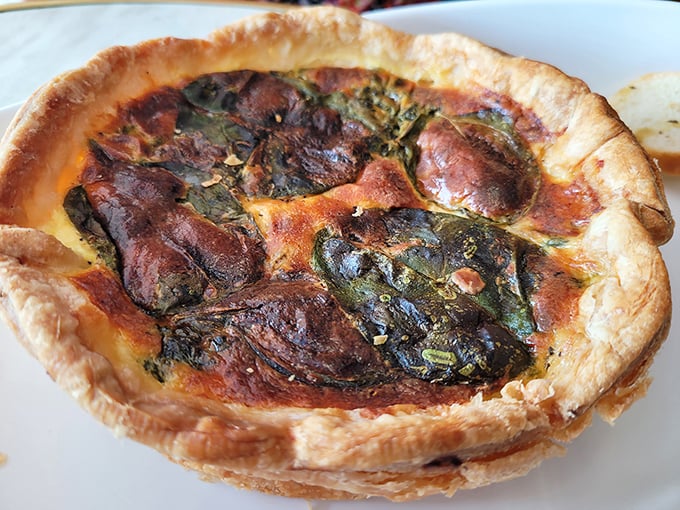This quiche didn't just rise—it ascended to pastry heaven. Flaky crust cradling a savory filling that makes store-bought versions hide in shame.