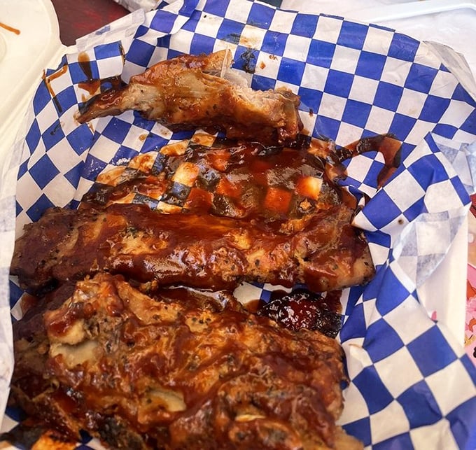 These riblets aren't just falling off the bone—they're practically jumping into your mouth with that glistening sauce.