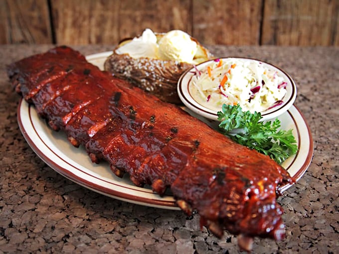 These ribs don't just fall off the bone – they practically leap onto your fork, dressed in a sauce that balances sweet and tangy notes perfectly.