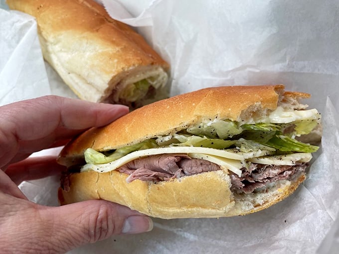 Behold the roast beef sandwich in its natural habitat – simple, honest, and packed with more meat than most people's weekly quota.