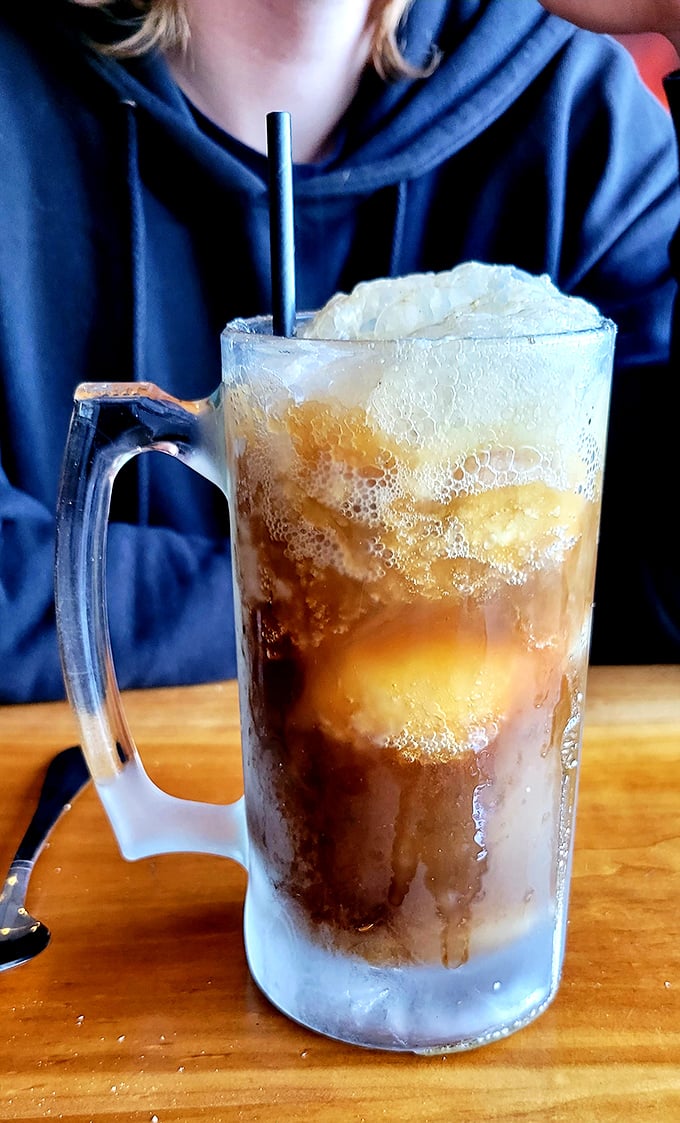 This root beer float isn't just a throwback to childhood – it's a frosty time machine that somehow improves on your memory of the original.