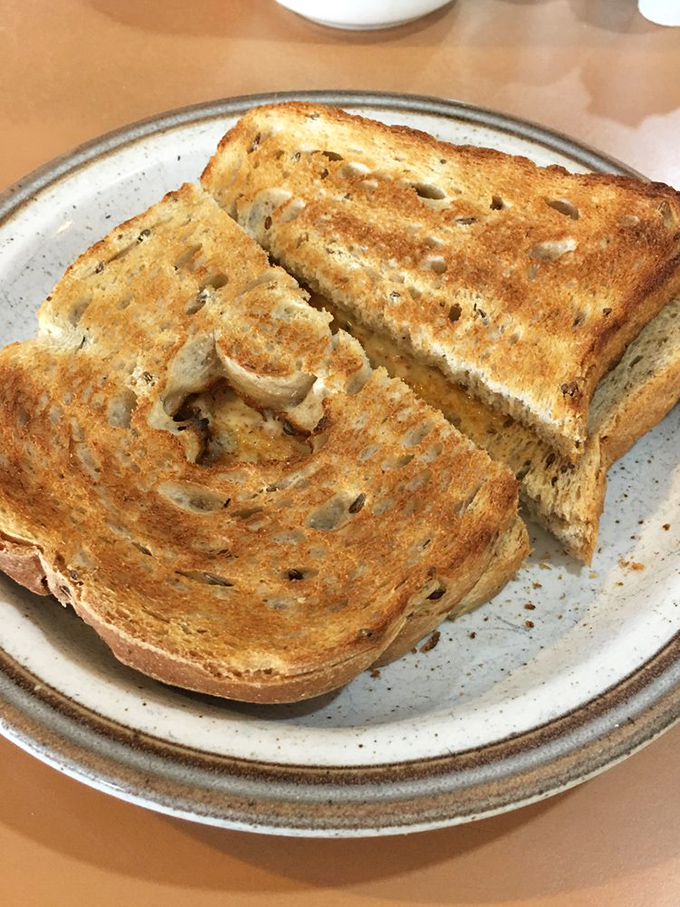 Toast isn't just toast at Jimmy's—it's a golden-brown canvas waiting for a schmear of butter and your breakfast dreams.