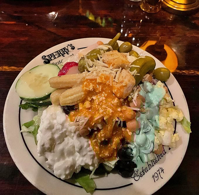The salad bar at Sperry's isn't just a prelude—it's a masterpiece of its own. Those marinated mushrooms have launched a thousand copycat recipes.