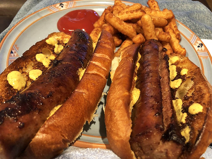 Sausage dogs with that perfect snap—like the universe created pork specifically for this moment of pure joy on a humble bun. 