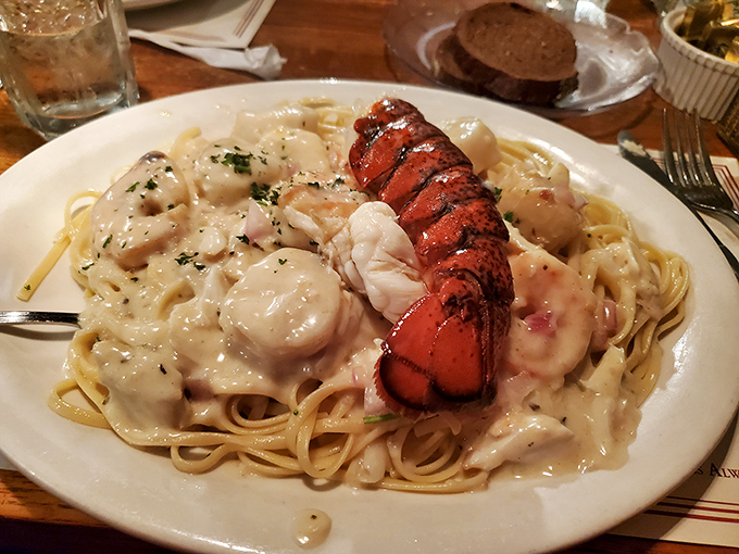 This seafood pasta doesn't just have a lobster tail—it's practically a love letter to the ocean, swimming in a creamy sauce that dreams are made of.