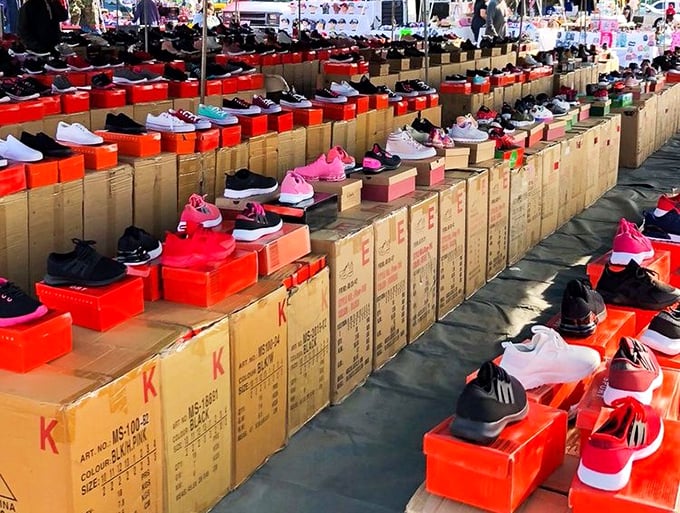 Sneaker heaven stretches to the horizon—a footwear fiesta where brand-new kicks await at prices that won't kick your budget.