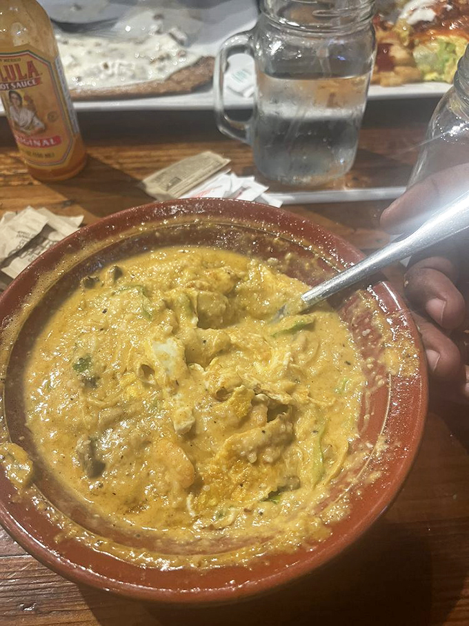 Shrimp and grits: the dish that proves breakfast in Georgia isn't playing around. Creamy, cheesy, and studded with plump shrimp—comfort in a bowl.