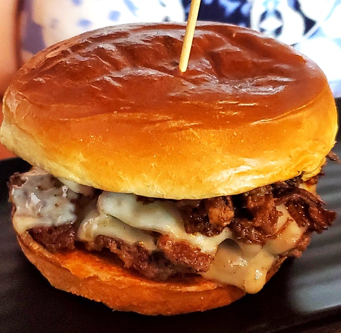 Melty cheese cascading over caramelized beef—this smash burger doesn't need a theme park ticket to create magical moments in Orlando.