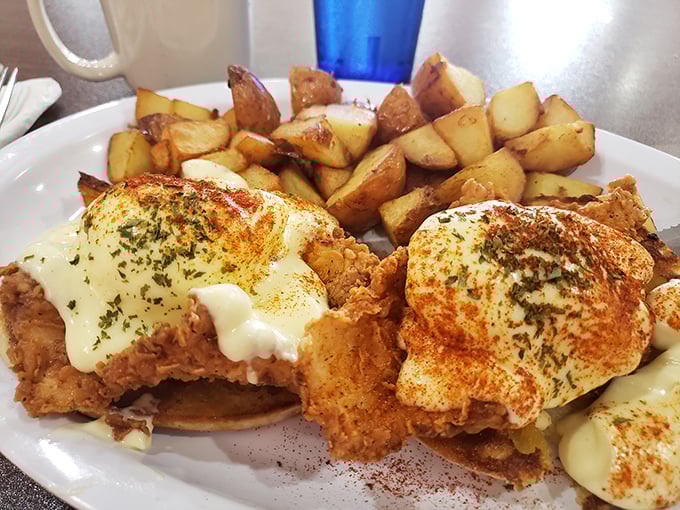 Whoever invented this Southern Benedict deserves a Nobel Prize in breakfast innovation. Crispy fried chicken crowned with eggs and hollandaise—morning royalty.