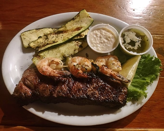 Surf meets turf in this carnivore's dream team. The steak and prawns aren't just sharing a plate—they're creating a flavor alliance worth crossing county lines for.
