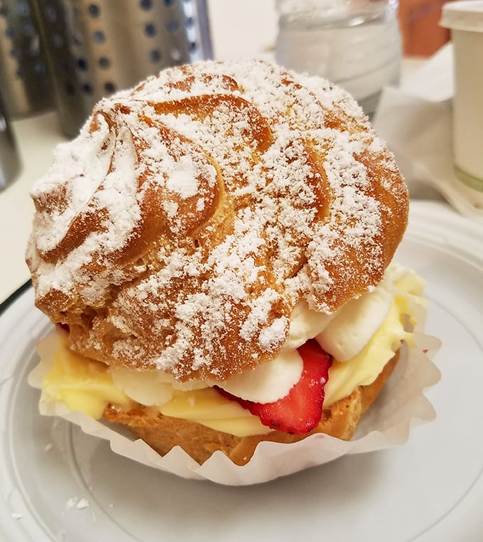 This cream puff doesn't just whisper "eat me"—it belts it out like Julie Andrews on an Austrian hillside.