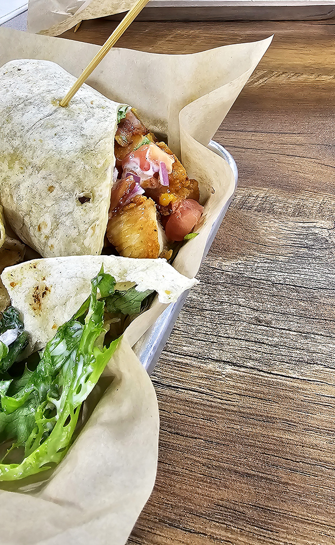 Tacos that don't play by the rules—fresh ingredients nestled in soft tortillas like precious cargo. A flavor fiesta worth celebrating.