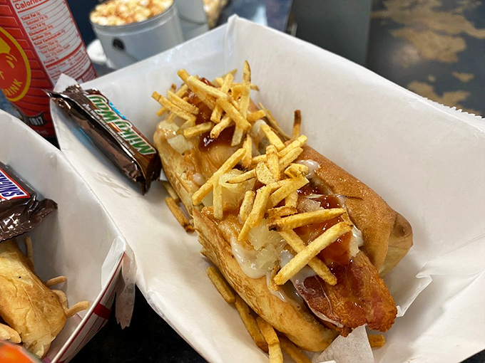 Potato sticks add unexpected crunch to this creation, like finding an extra twenty in your winter coat—a delightful surprise in every bite.