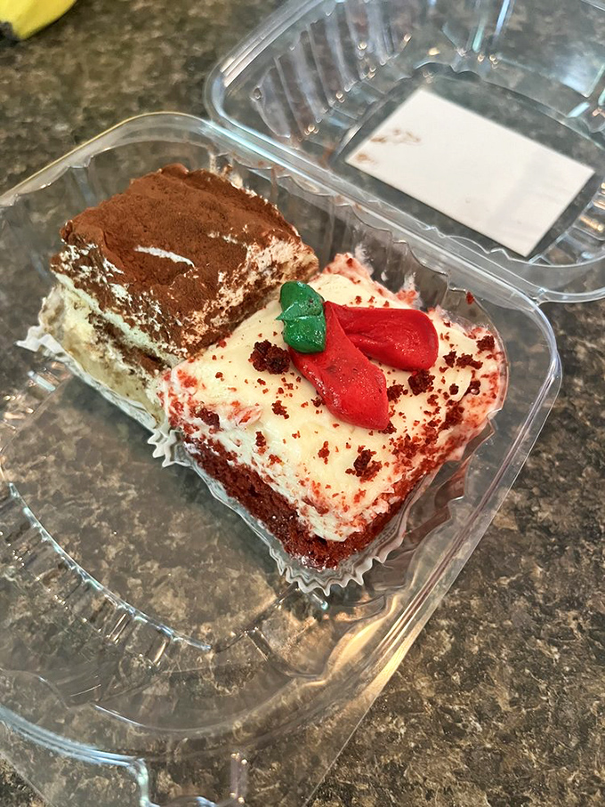 Red velvet and tiramisu squares playing nicely together in their clear container – like the dessert version of an apartment share that actually works out.