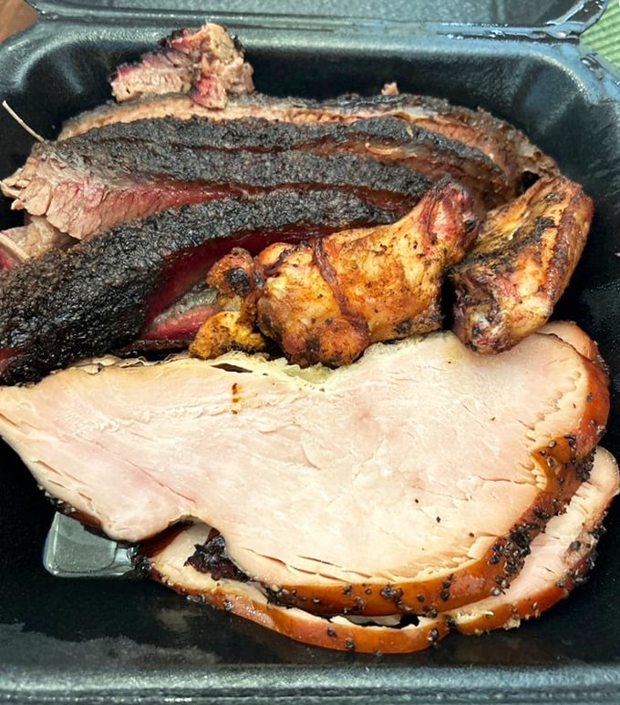 A barbecue platter that would make a Texan weep with joy—brisket with that signature black pepper crust alongside turkey that defies dryness.