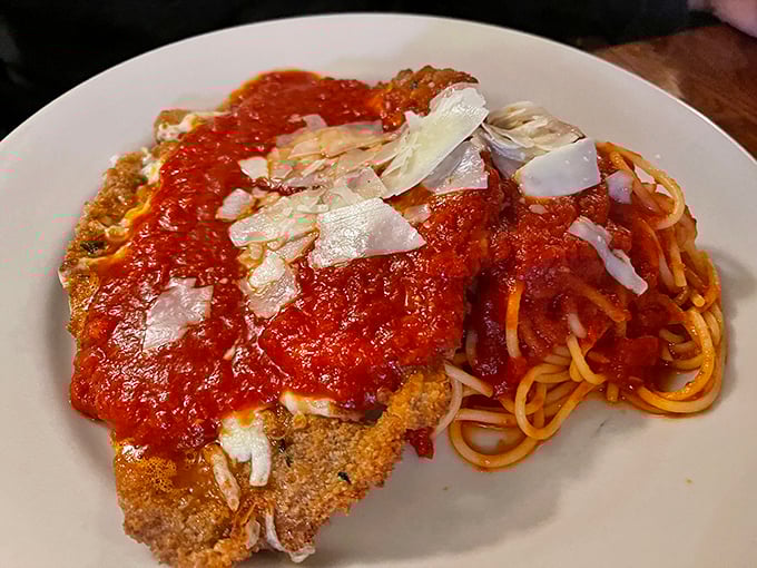 Veal Parmigiana that achieves the holy trinity of Italian perfection: crispy exterior, tender meat, and that magnificent red sauce.