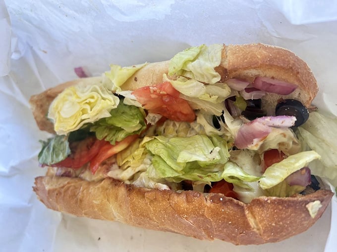 A proper hoagie bursting with fresh veggies—because sometimes you need something green before diving back into those wings. Balance, friends!