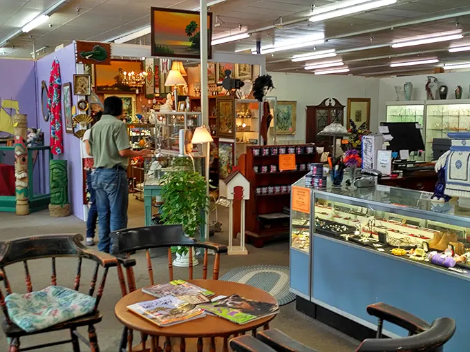 The best antique stores are interactive museums where you can touch the exhibits and even take them home – just ask this browser examining treasures.
