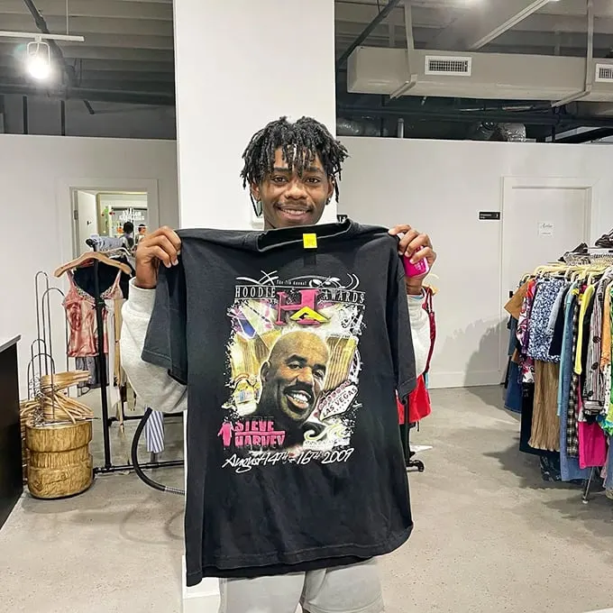 That moment when you find vintage gold—a Steve Harvey t-shirt that's somehow both ironic and genuinely cool at the same time. 