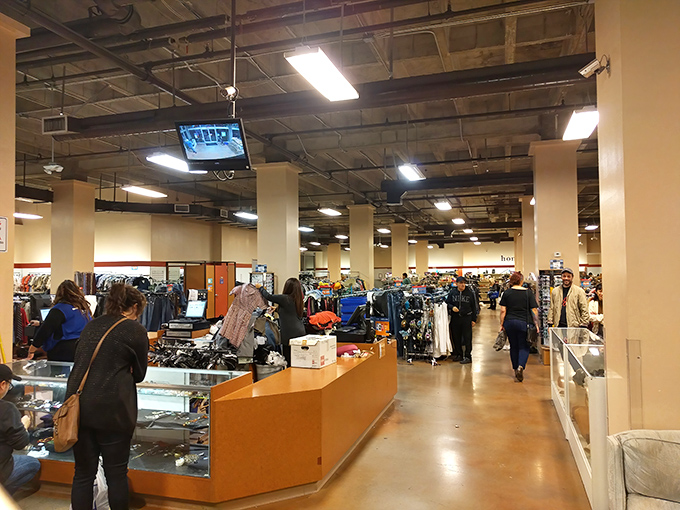 Thrift store anthropology in action—watch as seasoned hunters scan racks with the focus of diamond appraisers seeking their next score.