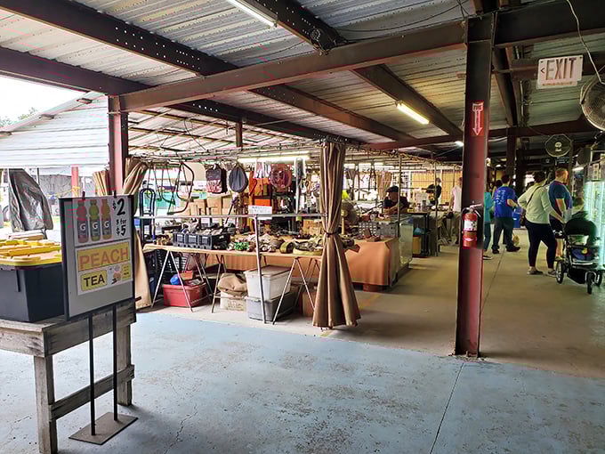 Where rustic meets retail therapy – shoppers browse under industrial ceilings while hunting for everything from vintage cameras to that perfect statement lamp.