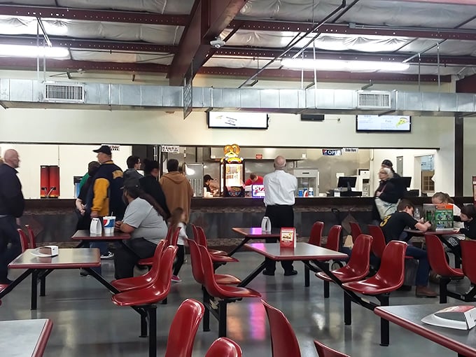 The cafeteria buzzes with deal-seekers comparing notes and refueling with simple fare—the perfect intermission in a day-long treasure hunt.