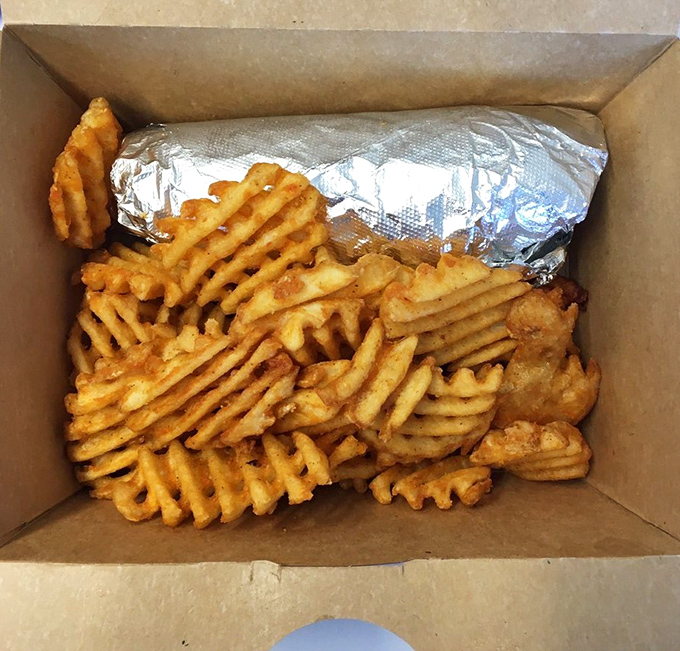 Waffle fries and a foil-wrapped gyro—the lunch combo that makes coworkers eye your takeout with the envy usually reserved for lottery winners.