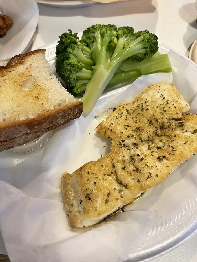 Simple perfection on a plate: delicately seasoned white fish with fresh broccoli. Sometimes the least complicated dishes require the most skill to execute flawlessly.