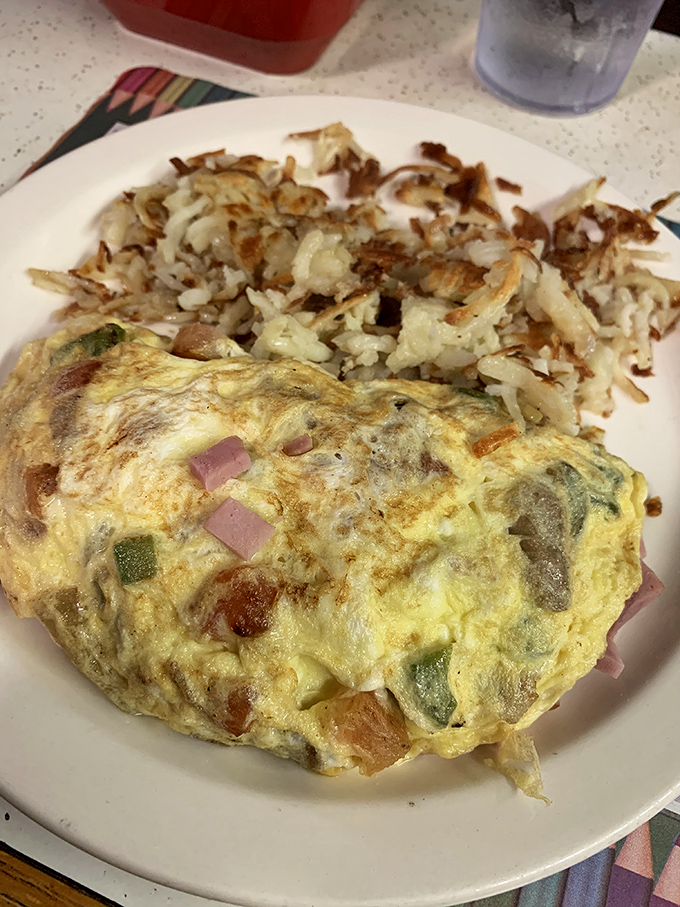 This Western omelet with crispy hashbrowns isn't just breakfast—it's edible therapy after a long week. Worth setting your alarm for.