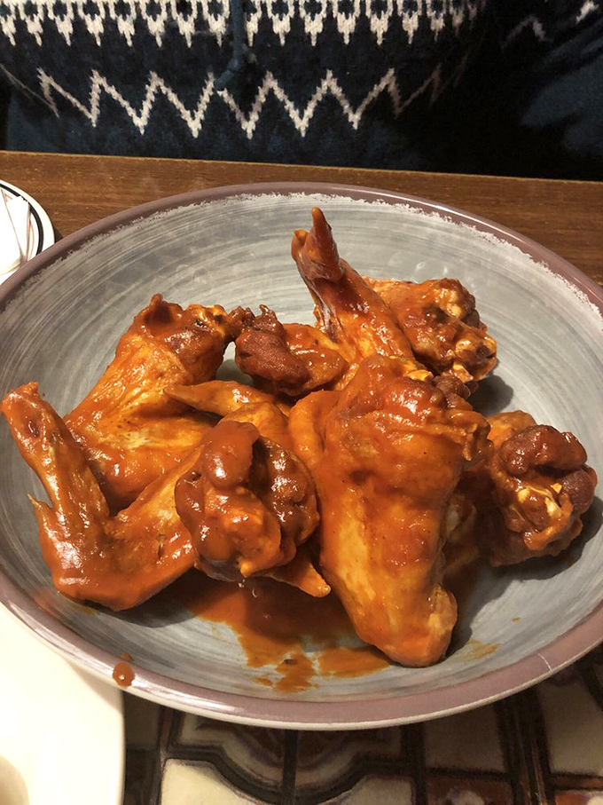 These wings aren't just good, they're "call-your-cardiologist-and-apologize-in-advance" good. Worth every napkin and moment of sticky-fingered bliss.