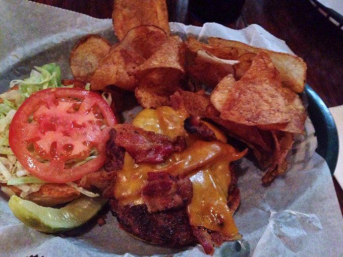 The champion has entered the ring! Melted cheese cascading over a perfectly seared patty with crisp bacon—a knockout combination that's impossible to resist.