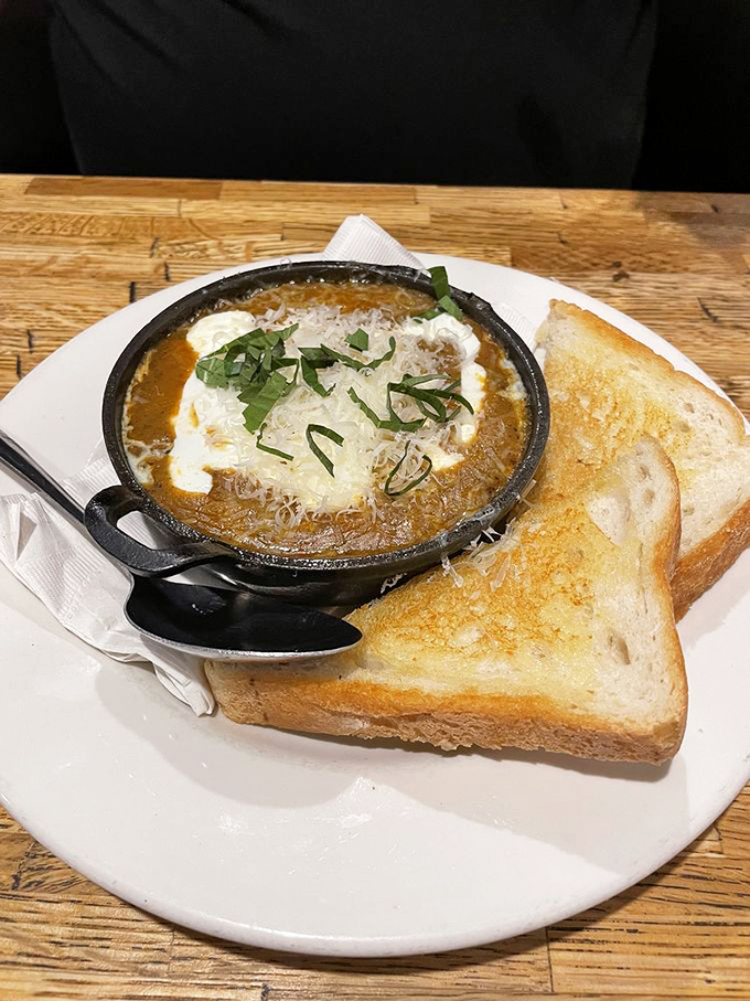 This skillet of bubbling goodness is what breakfast dreams are made of. Toast soldiers standing by for the perfect dip-and-swipe maneuver.