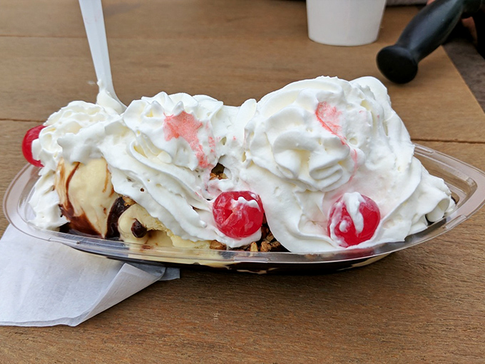 The banana split that launched a thousand diets—and was worth every single calorie. Whipped cream mountains with cherry flag planted firmly on top.