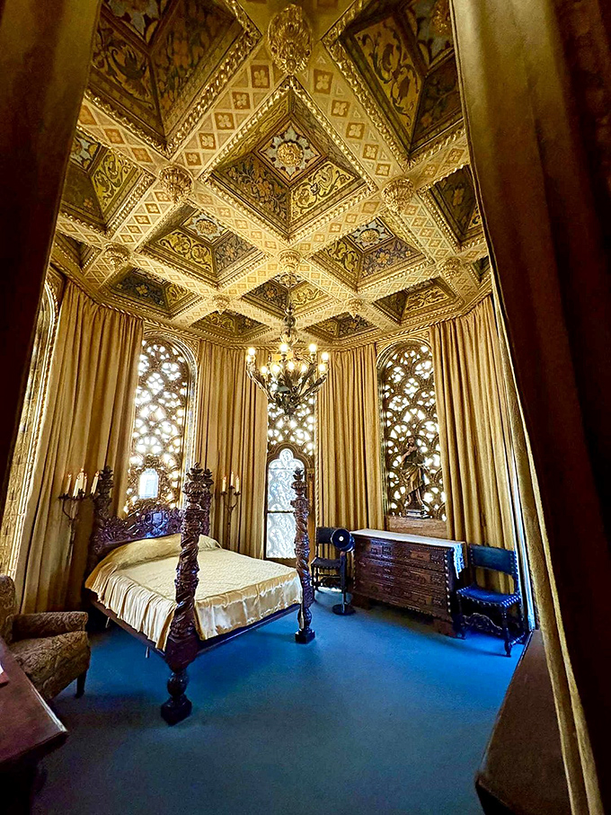 This bedroom's gilded ceiling and four-poster bed might make you wonder if you've wandered onto a movie set rather than a real sleeping chamber.