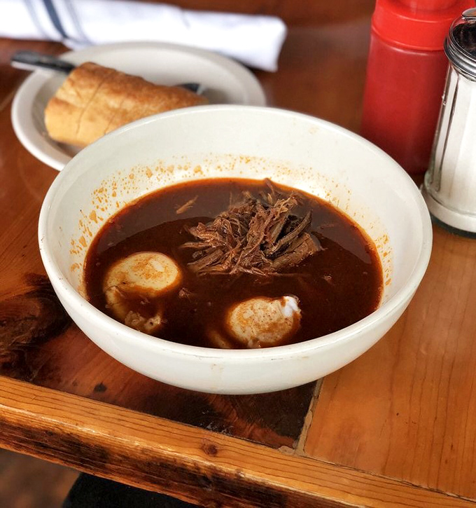 This isn't just soup—it's a brisket revelation in liquid form. Those floating dumplings are like flavor lifeboats in a sea of savory goodness.