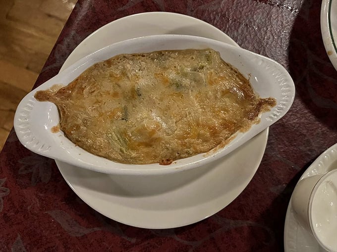 The legendary broccoli casserole—where vegetables transcend their humble origins and become something worth crossing county lines for.