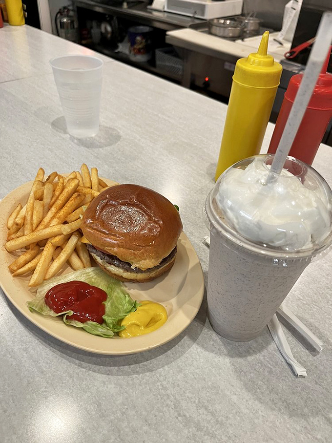 The classic American burger and fries—where the patty meets the bun in a romance that's outlasted most Hollywood marriages.