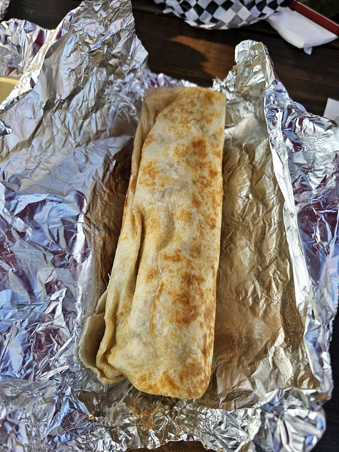 This isn't just a burrito—it's a masterclass in tortilla engineering. Every bite delivers the perfect ratio of fillings from end to end.