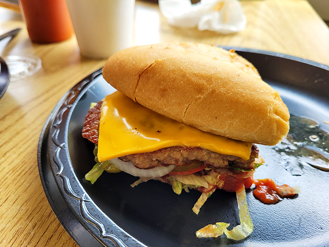 Forget fancy burger joints with their truffle aioli – this honest cheeseburger delivers the kind of satisfaction that needs no translation or explanation.