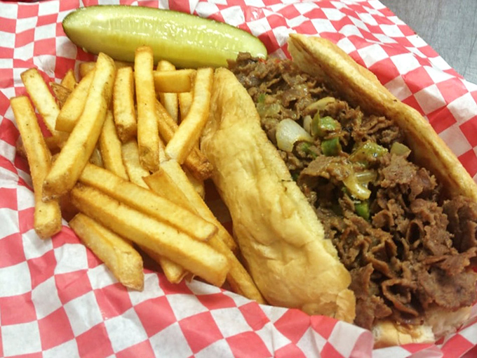 This cheesesteak doesn't need Philadelphia's approval—tender meat, perfectly grilled onions, and fries that deserve their own fan club.
