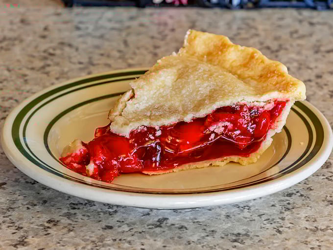This cherry pie isn't just dessert—it's edible stained glass. The ruby filling practically glows with summer sunshine.