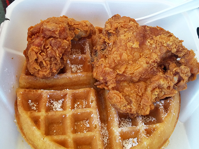 The holy matrimony of crispy fried chicken and golden waffles—a relationship so perfect it should have its own reality show.