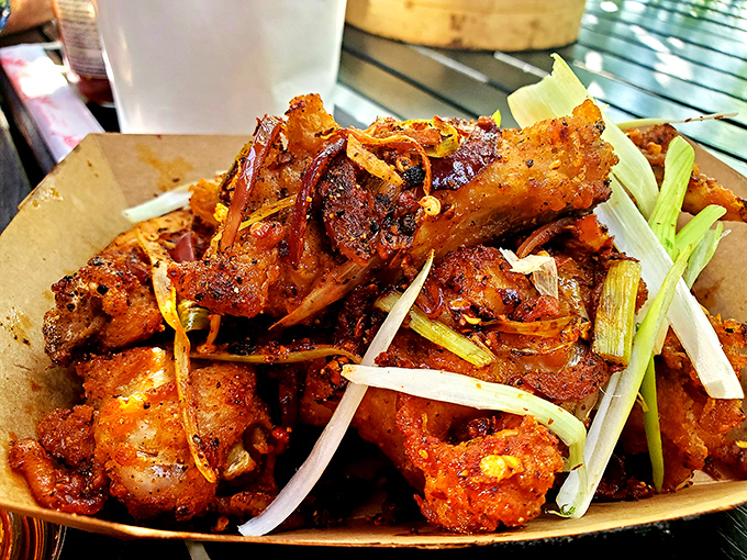 The infamous wings that sparked a San Diego sensation. Crispy, caramelized, and garnished with fresh scallions—these are worth the drive from anywhere in California.