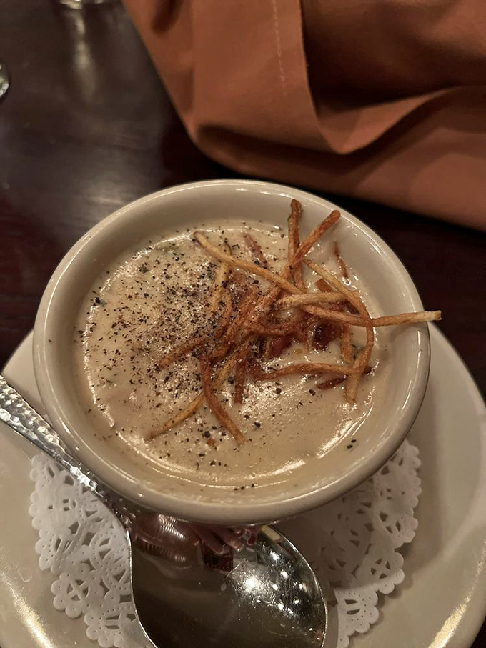 This isn't just soup – it's a creamy clam chowder topped with crispy wisps that'll make you question why you've settled for lesser bowls your entire life.