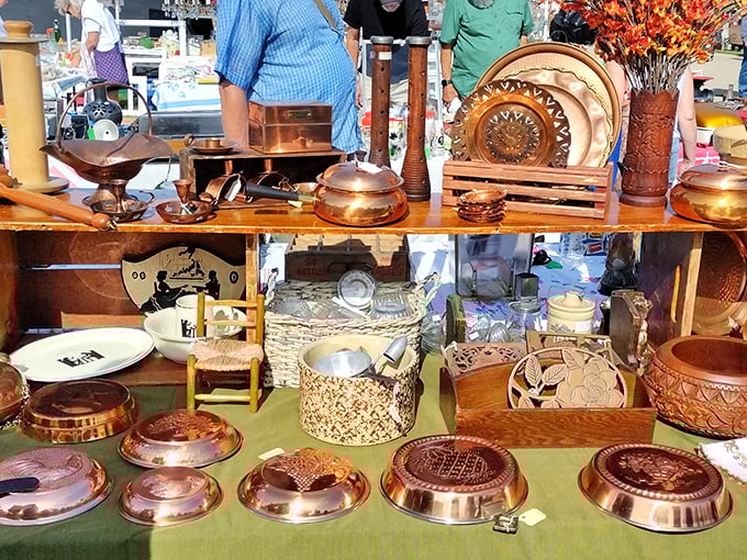 Copper cookware gleams in the sunlight, each piece telling stories of family dinners past – before non-stick pans and microwave meals changed everything.