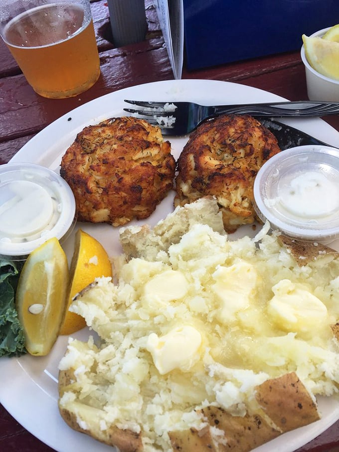 These golden crab cakes pack more jumbo lump meat than a treasure chest, served with creamy mashed potatoes.
