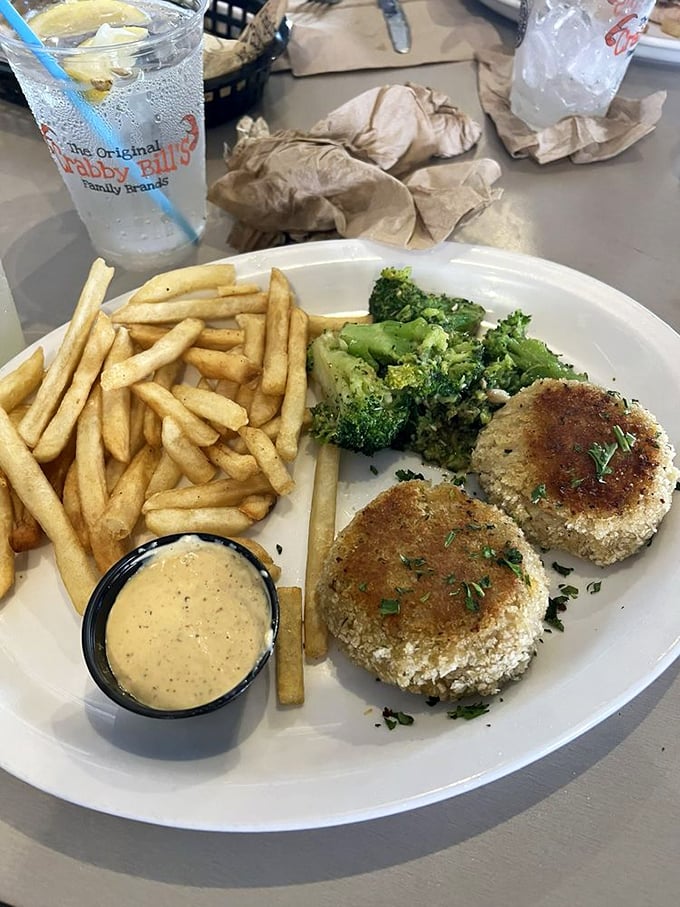 Crab cakes that are actually crab? Revolutionary! These golden-brown beauties are more crustacean than filler, served with fries and broccoli for the illusion of virtue.