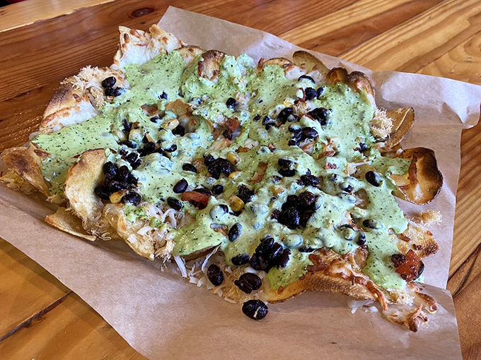 Not your average nachos! This seafood-topped flatbread is what happens when East Coast tradition meets West Coast innovation—a delicious cultural exchange program.